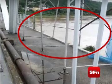 Vídeo: Grade de proteção da Ponte Metálica desaba durante chuva com ...
